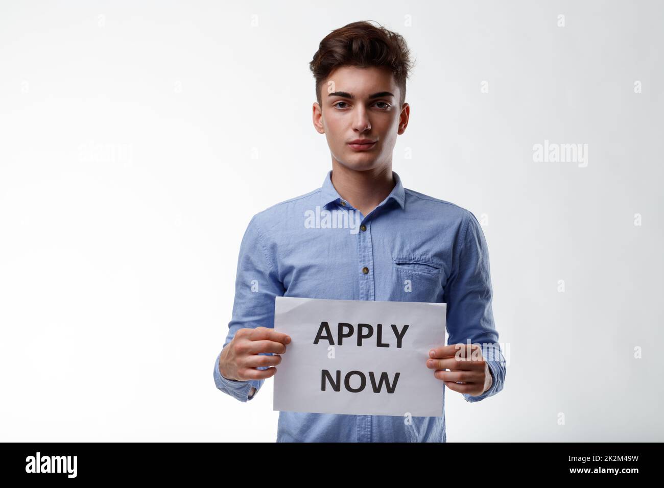 Man holding sign hi-res stock photography and images - Alamy