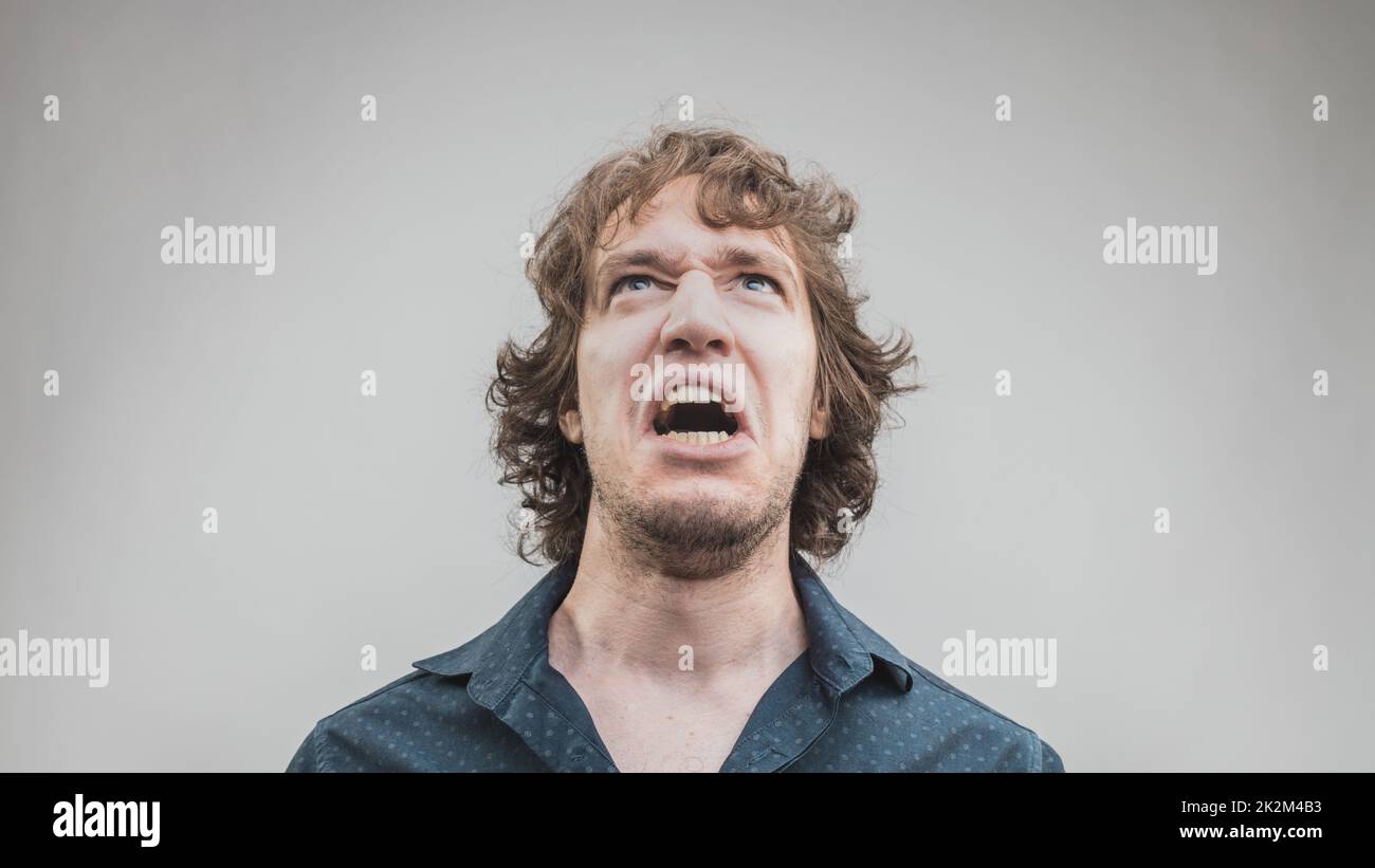 angry man shouting and cursing Stock Photo - Alamy