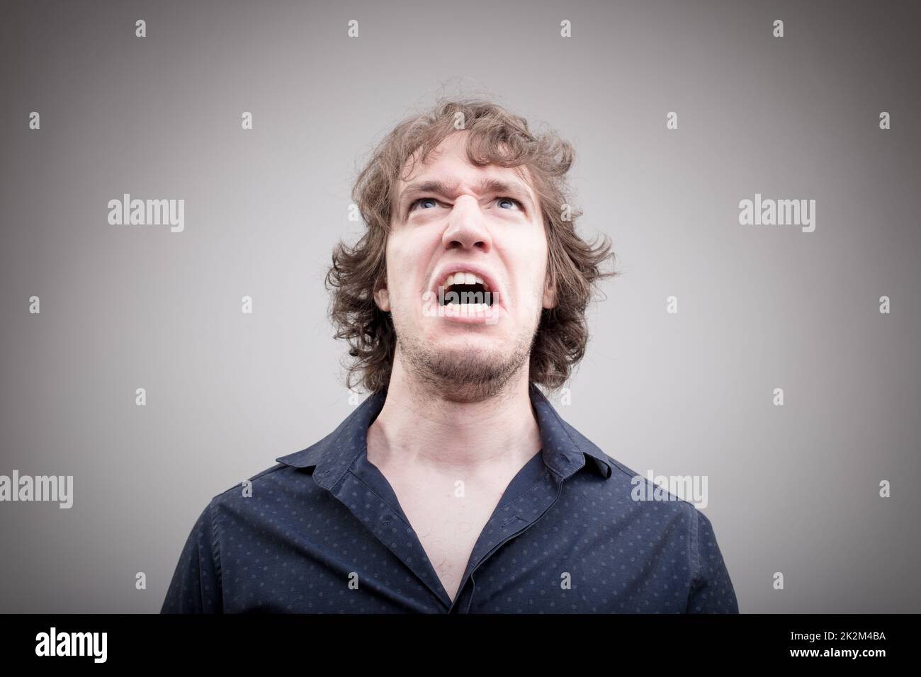 angry man shouting and cursing Stock Photo - Alamy