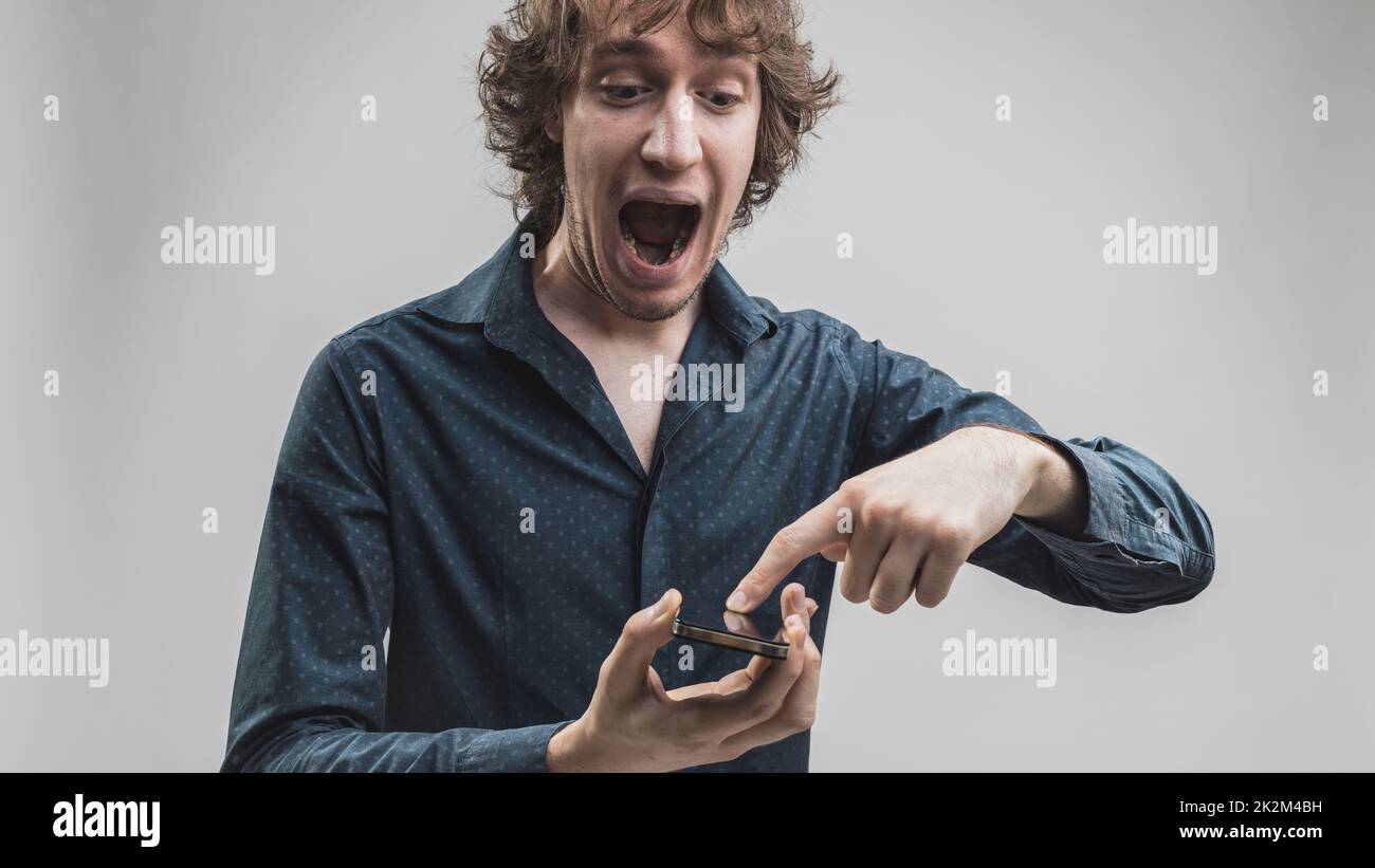 Amused man hi-res stock photography and images - Alamy
