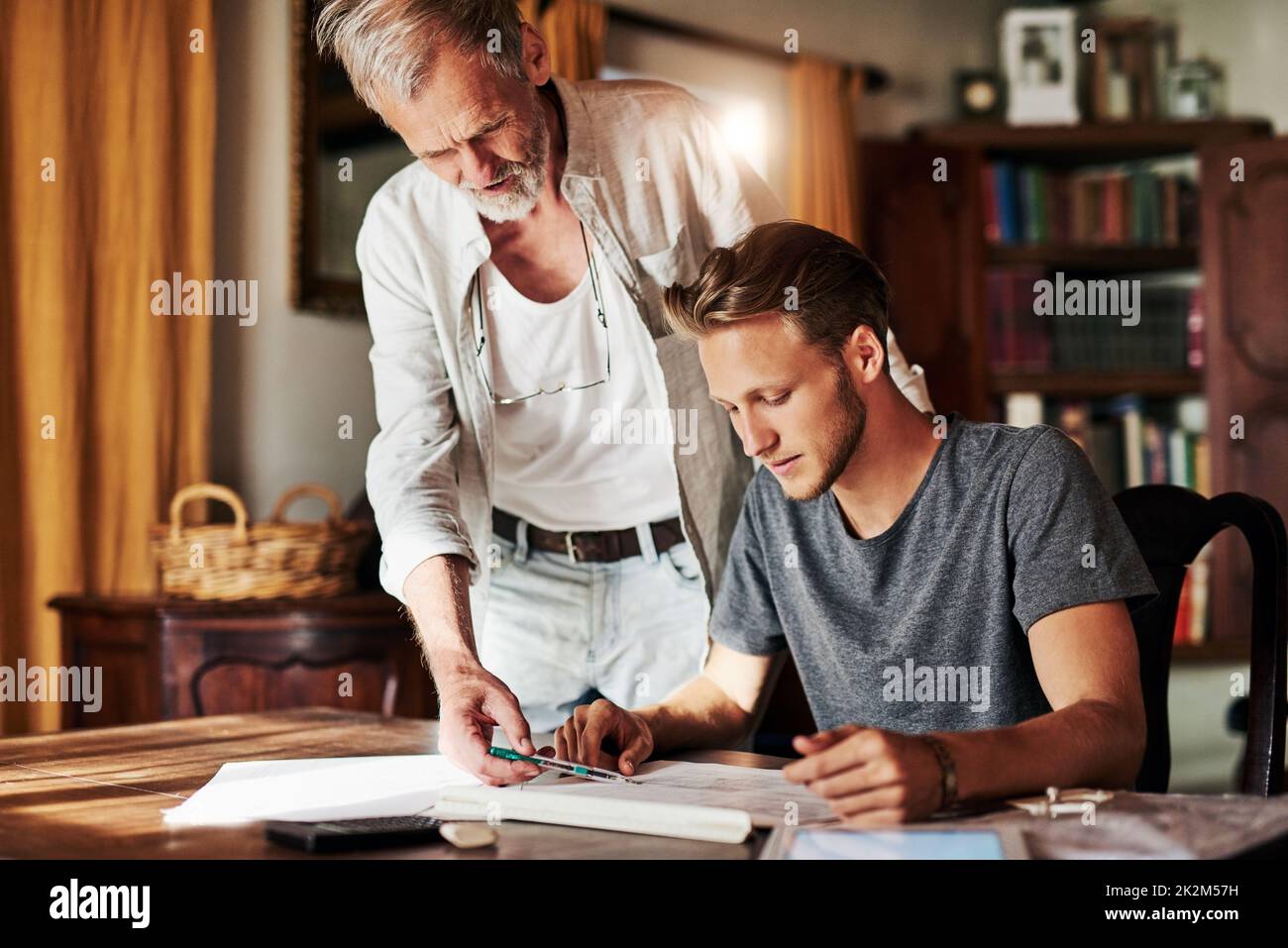 Men working together hi-res stock photography and images - Alamy