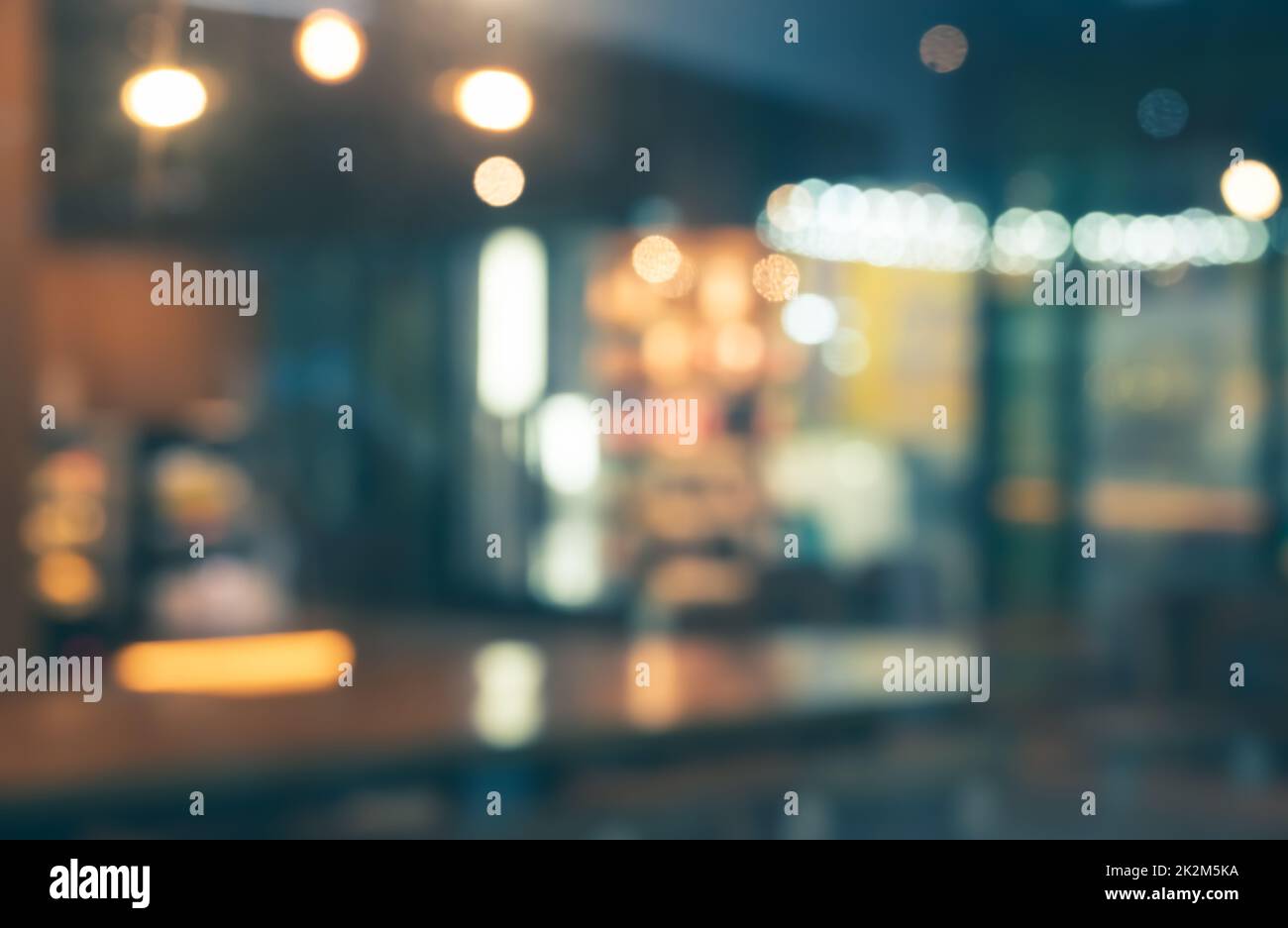 Coffee shop blur background with bokeh night lights Stock Photo - Alamy