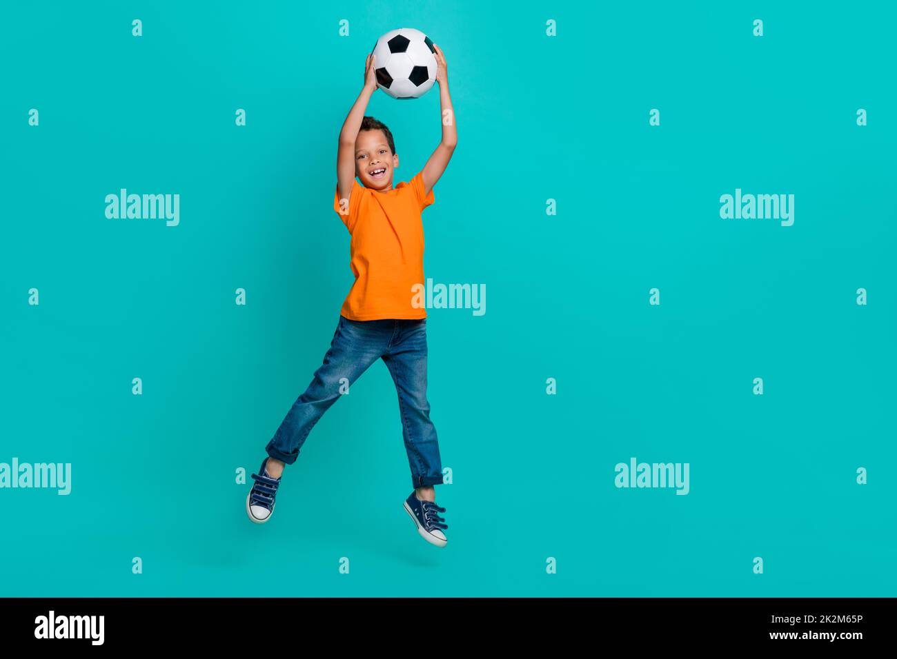 Full length photo of cheerful funny funky boy football fan champion ...