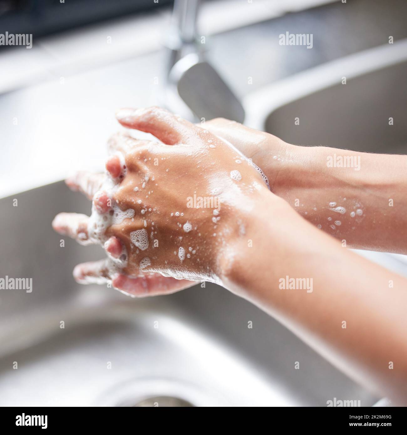 I wash my hands the minute I enter the house. Cropped shot of an ...