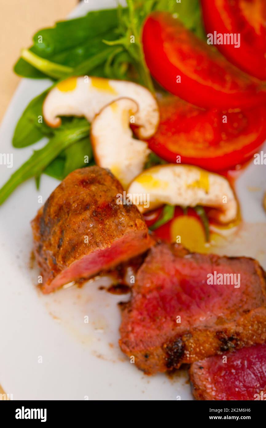 beef filet mignon grilled with vegetables Stock Photo - Alamy