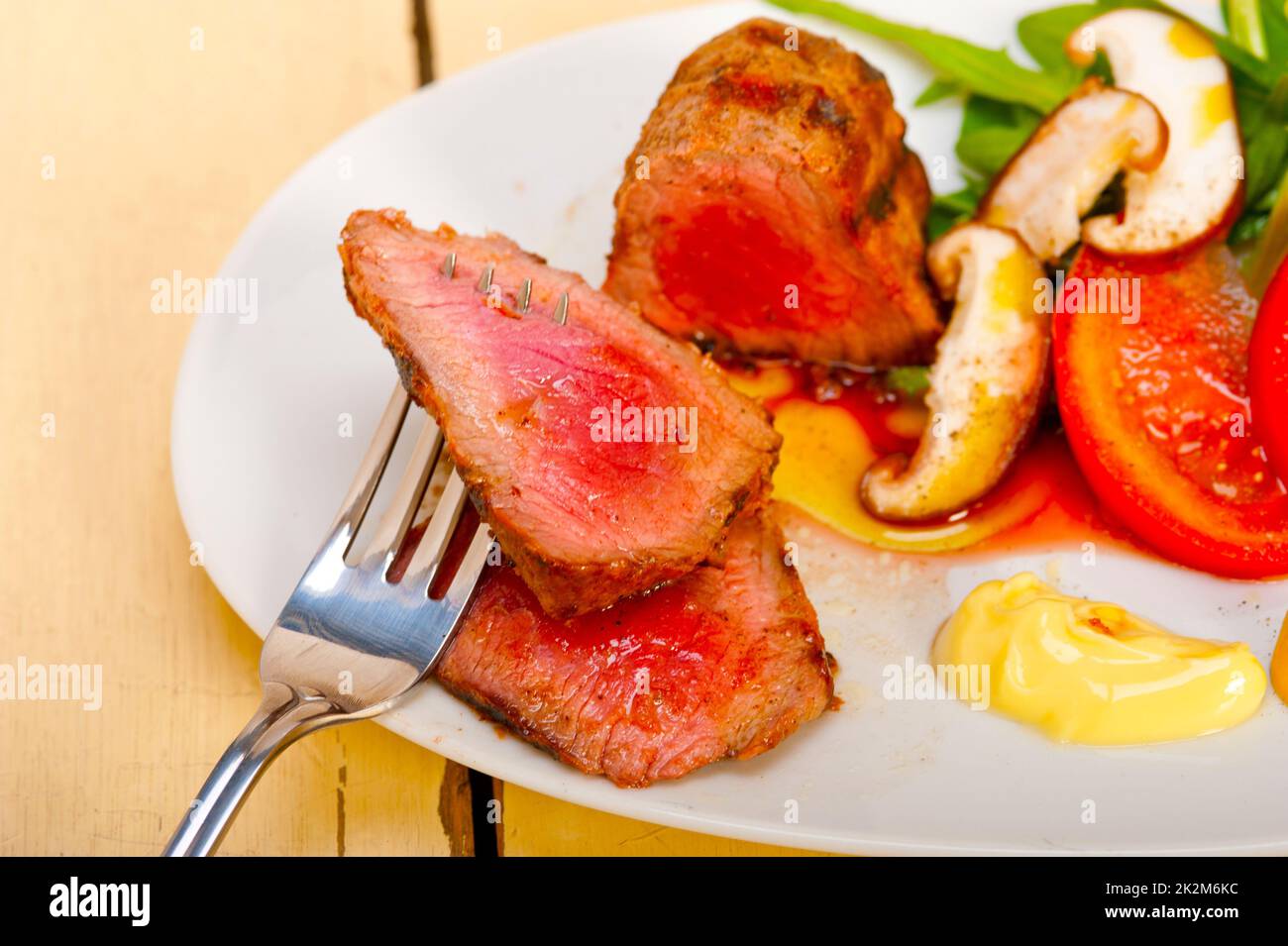 beef filet mignon grilled with vegetables Stock Photo - Alamy
