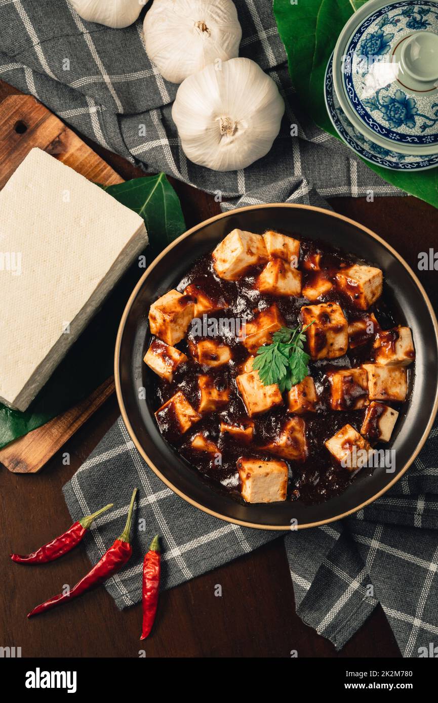 Traditional spicy hot chinese food,Mapo Tofu dressed with tea cup,on ...