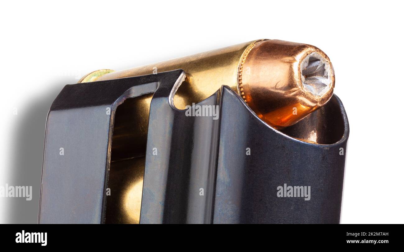 Gun magazine topped off with hollow points up close with drop shadow ...