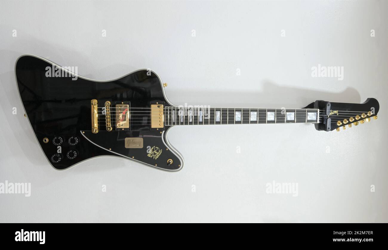 A Gibson Firebird Custom in Ebony with gold fittings Stock Photo - Alamy