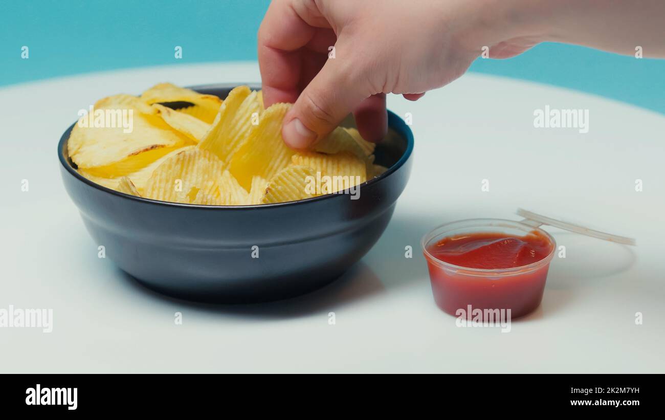 Man chips ketchup studio hi-res stock photography and images - Alamy