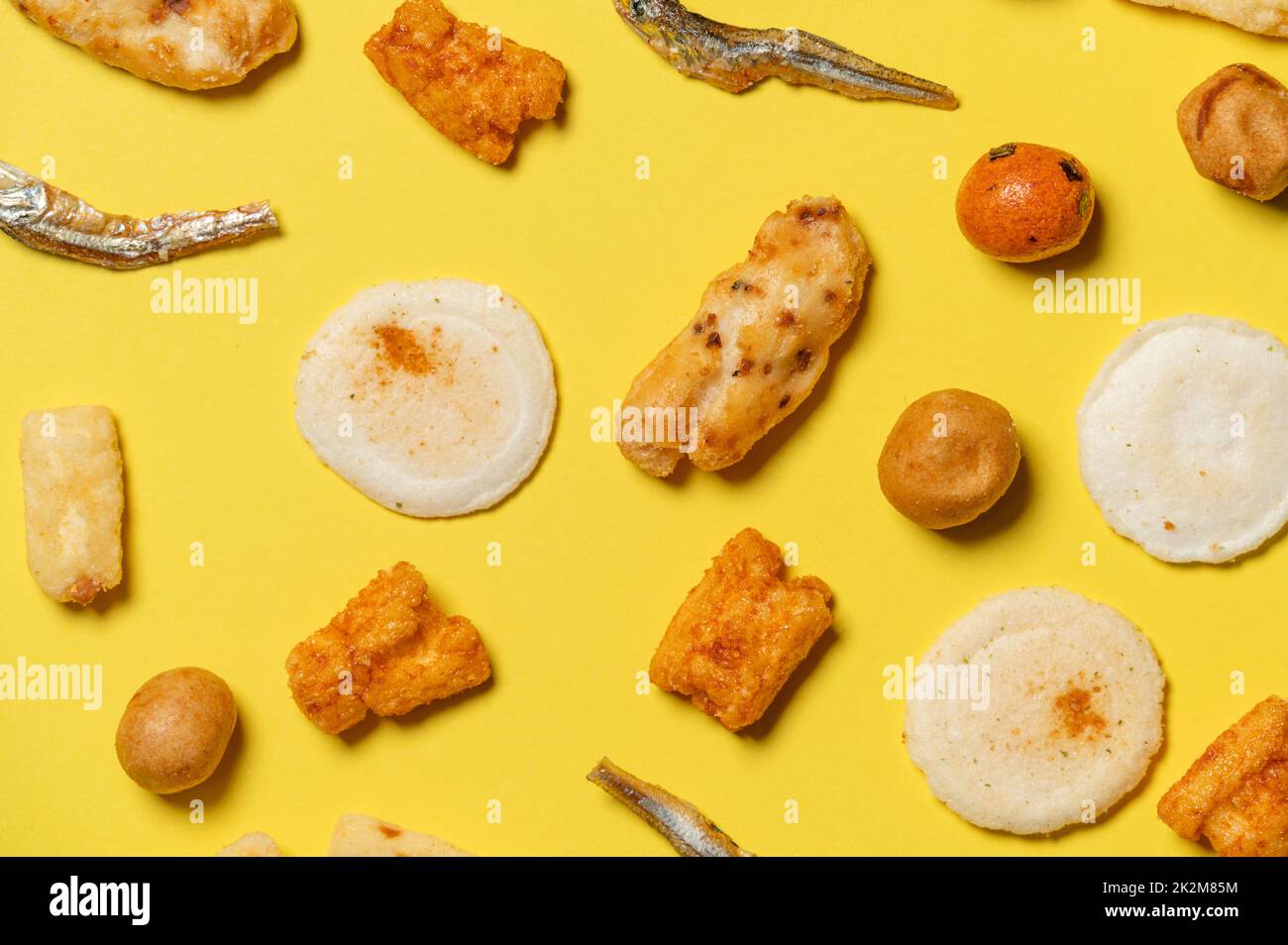various japanese traditional snacks with crackers,dried fish and yellow ...