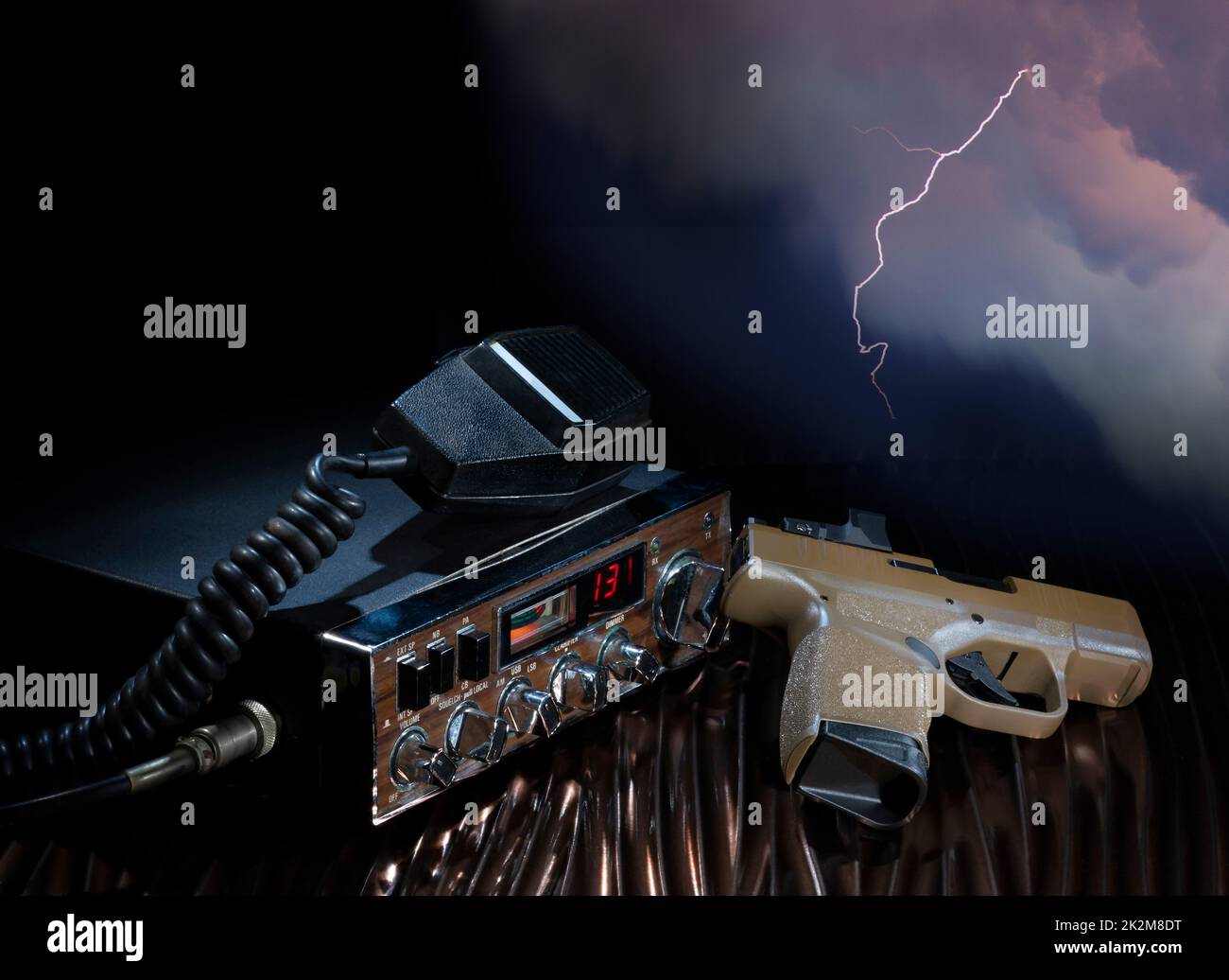 Gun and CB radio with lightning storm behind Stock Photo - Alamy Gun and CB radio with lightning storm behind Stock Photo - Alamy