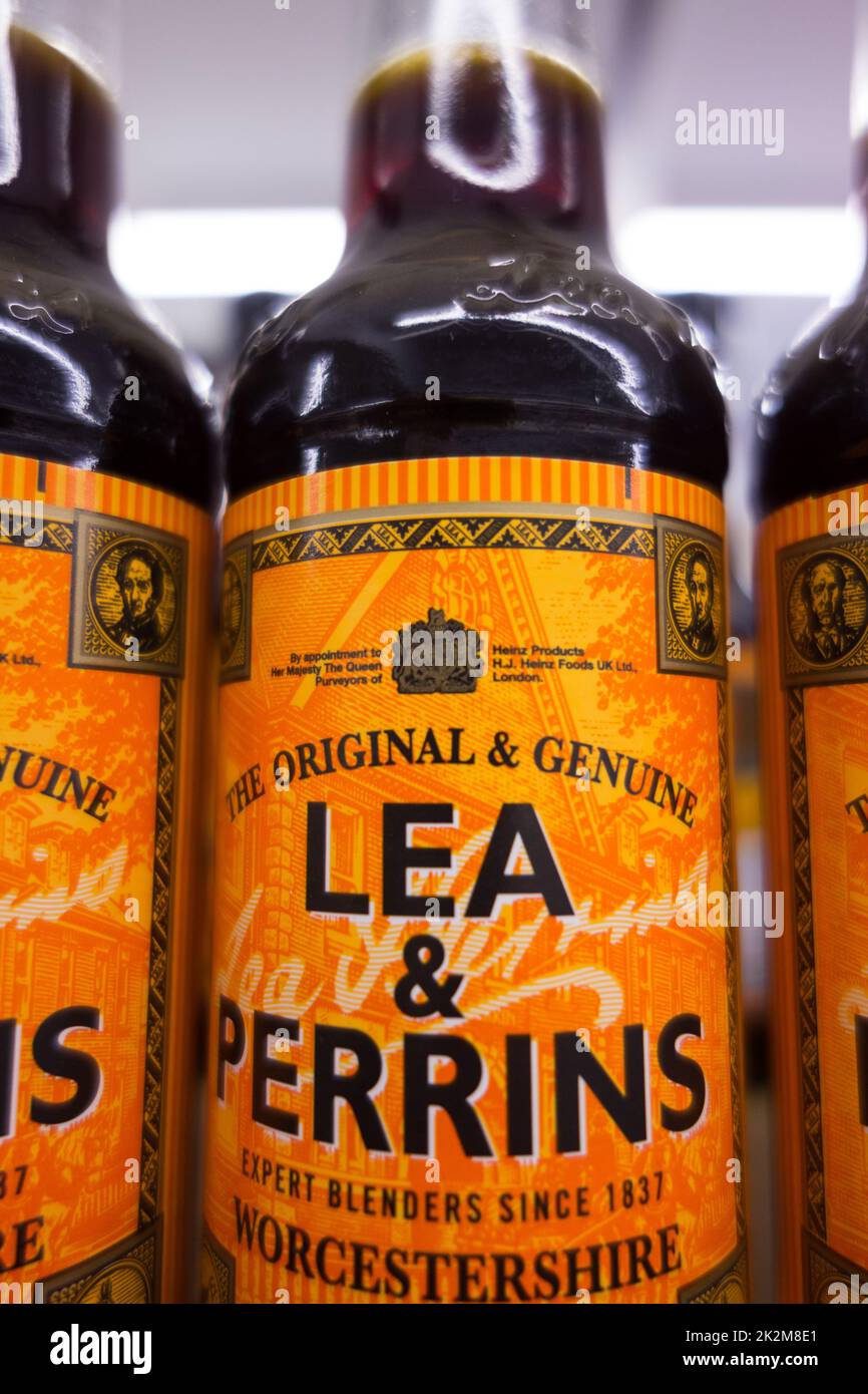 Closeup of Lea and Perrins glass bottles on a shelf in a supermarket ...