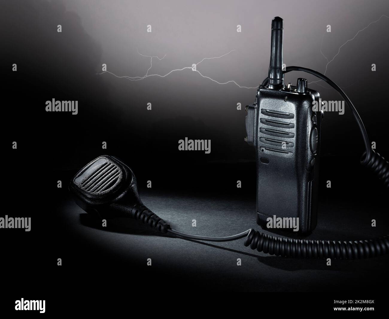 Emergency radio with lightning and clouds behind Stock Photo - Alamy