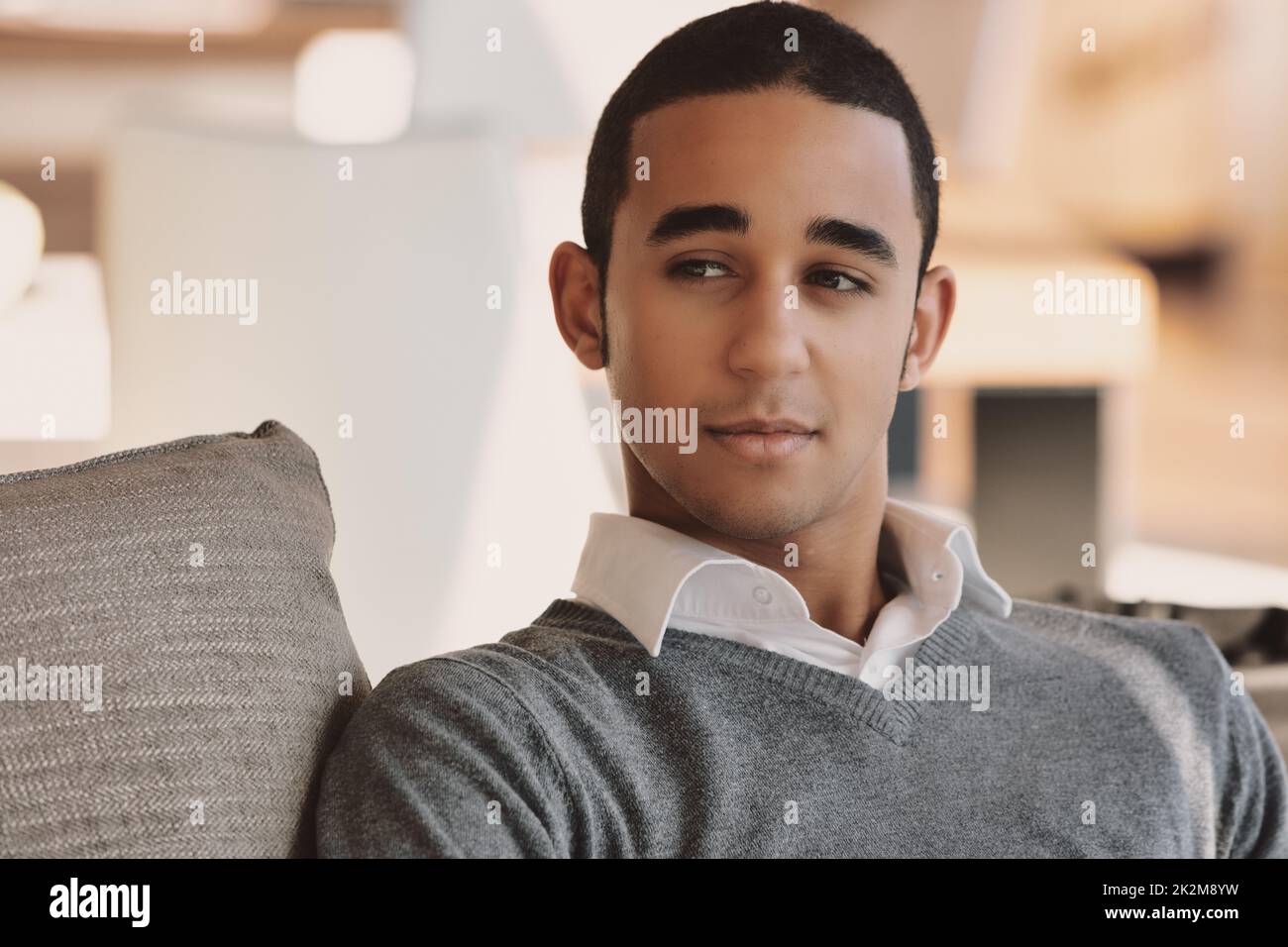 Portrait of a thoughtful young man in smart clothes Stock Photo - Alamy