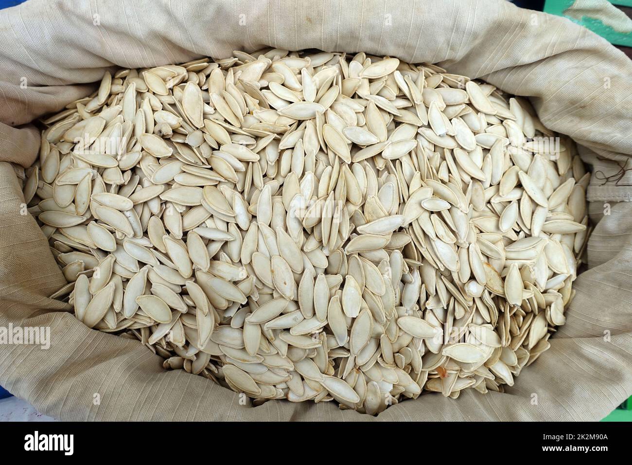 Unpackaged edible pumpkin seeds sold in cloth bags, organic ancestor ...