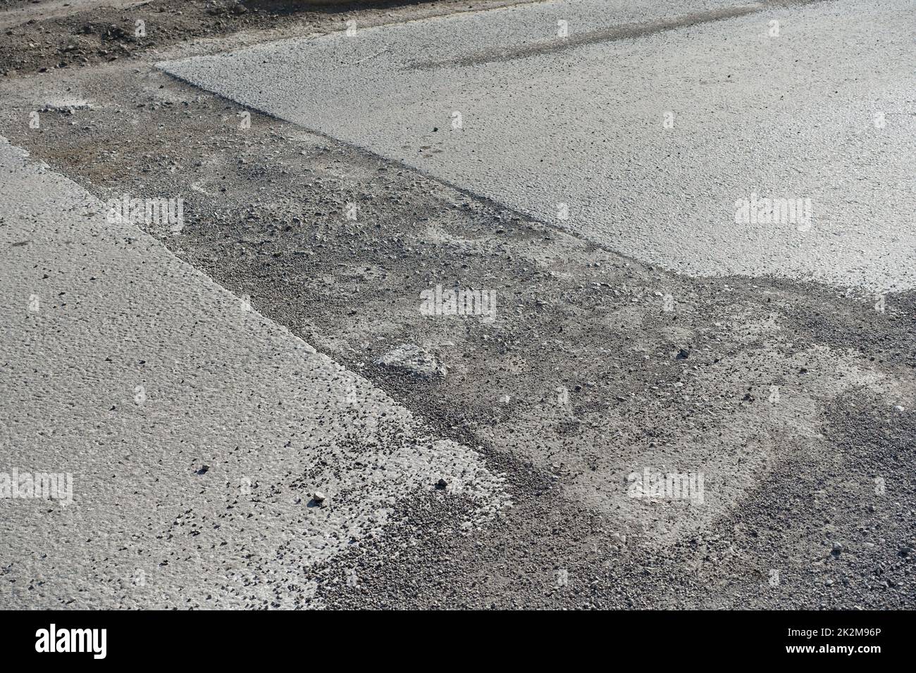 Patched road hi-res stock photography and images - Alamy