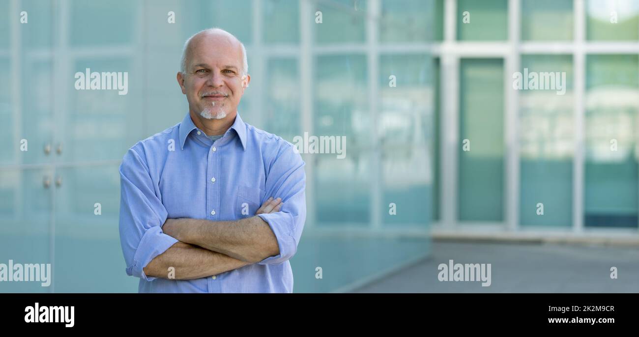 Panorama banner of a successful senior businessman Stock Photo - Alamy