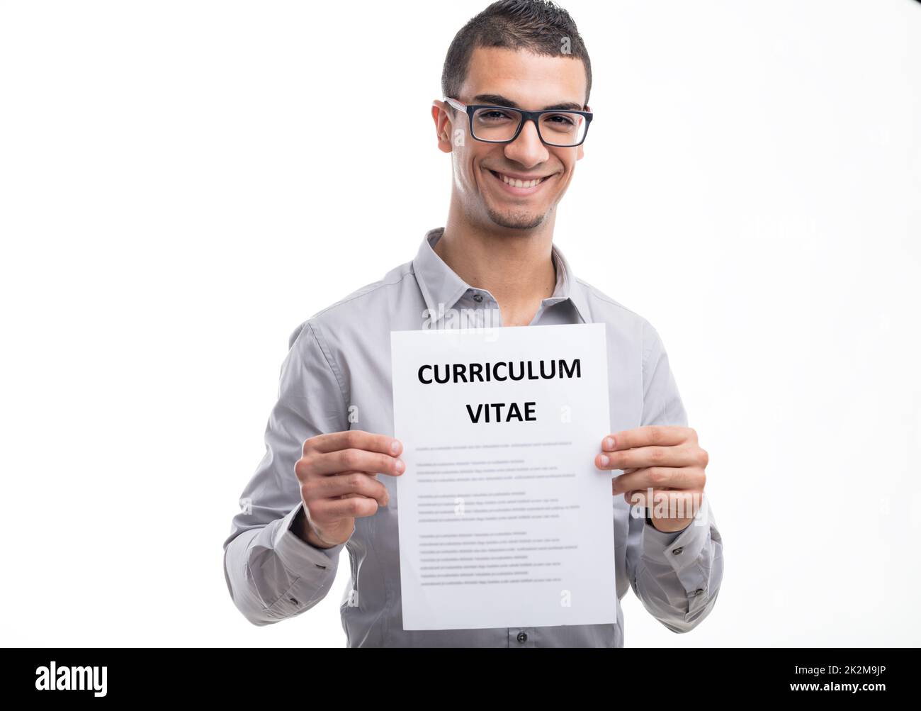 Young smiling man holding curriculum vitae Stock Photo - Alamy