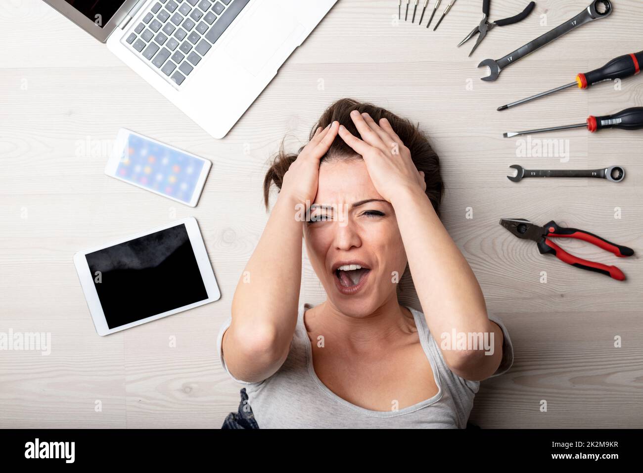 woman worried about computers that never work Stock Photo - Alamy