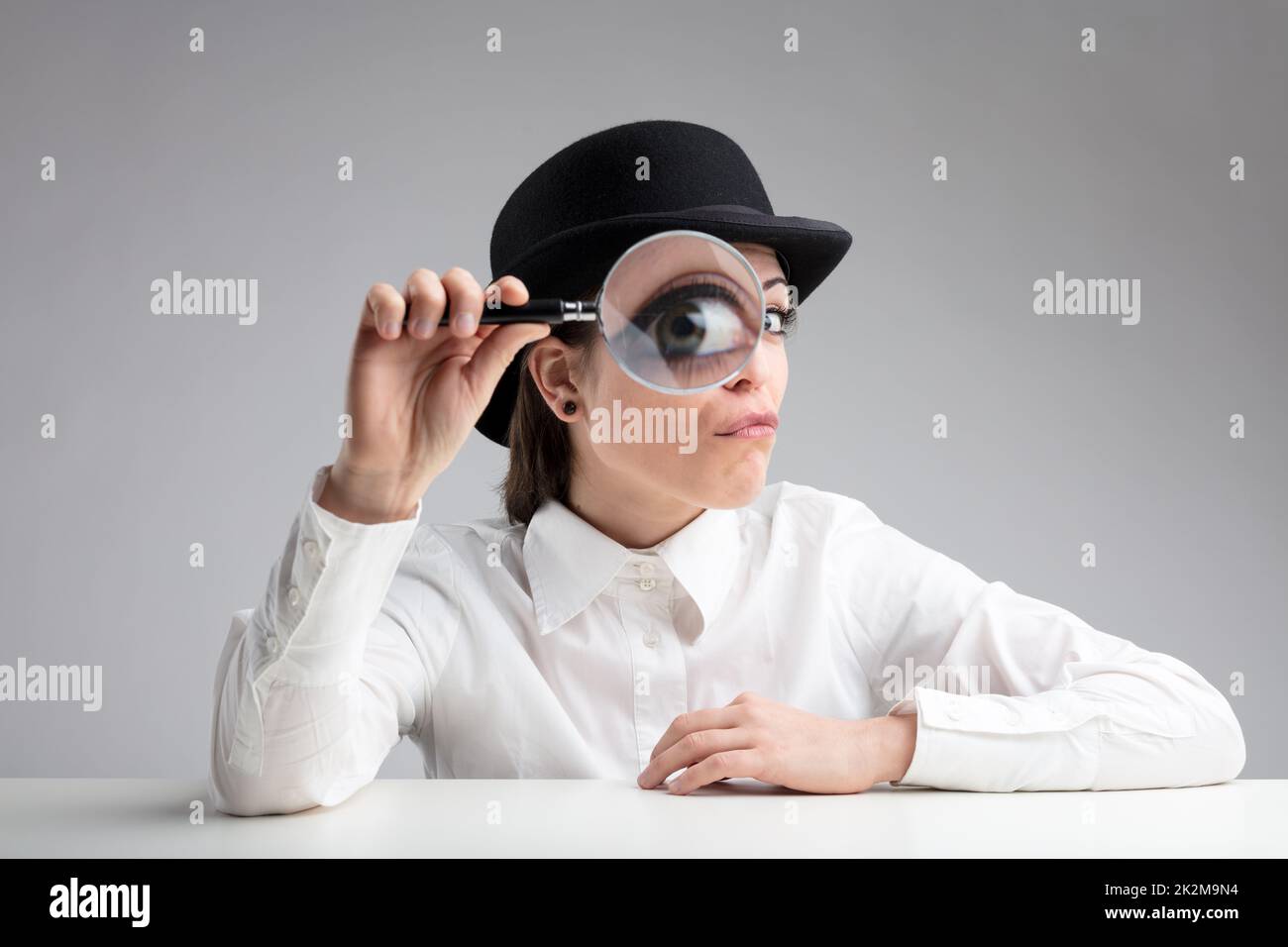 looking for information and examining Stock Photo - Alamy