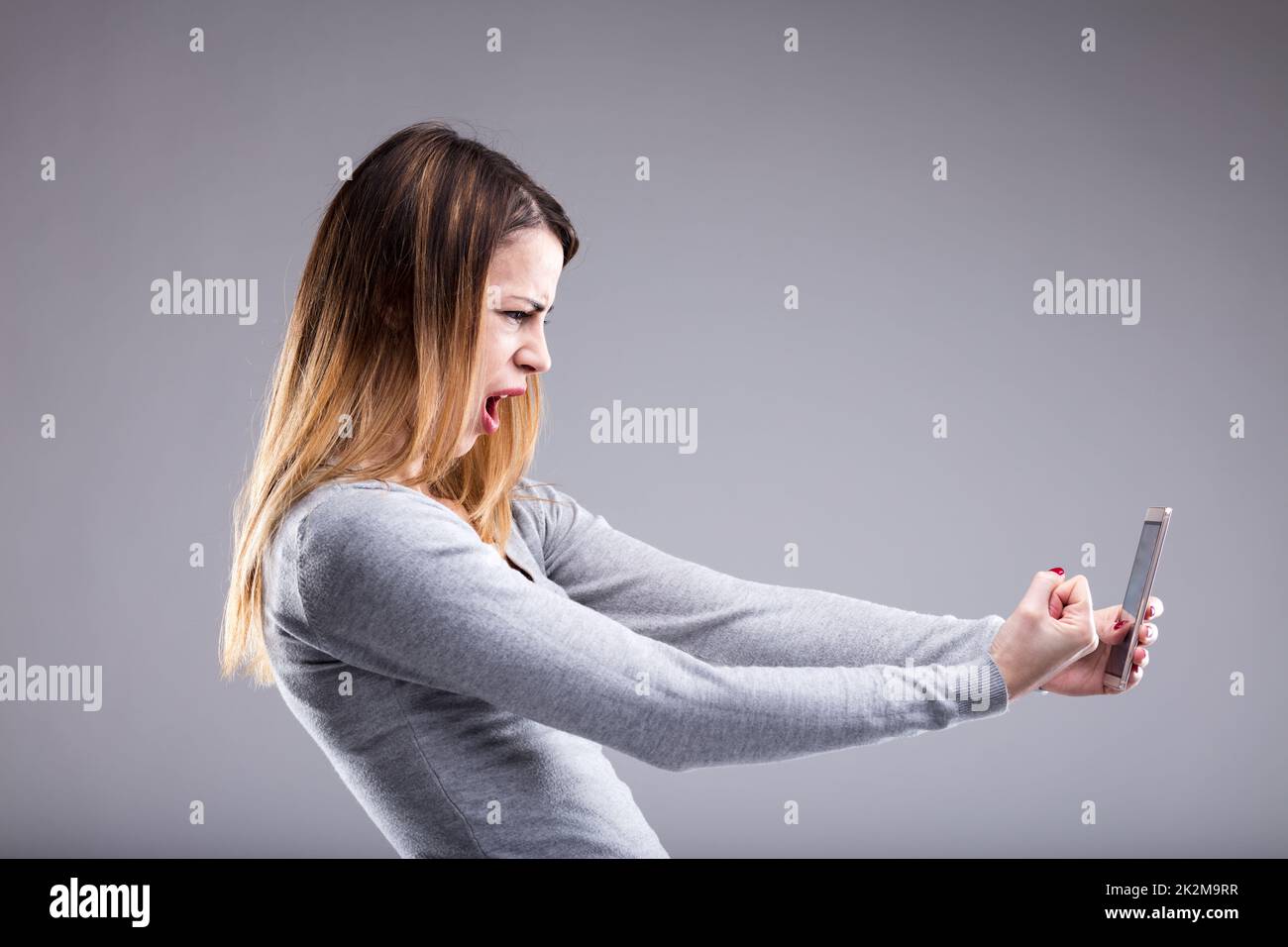 Angry woman phone hi-res stock photography and images - Alamy