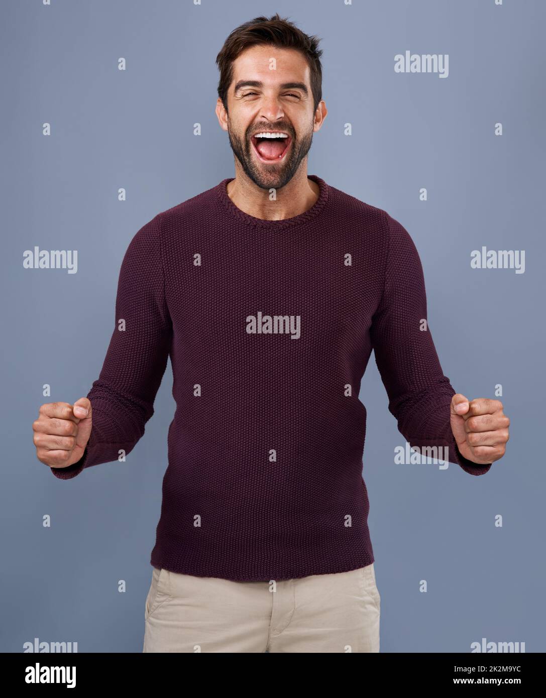 Now thats worth celebrating. Studio shot of a handsome young man ...