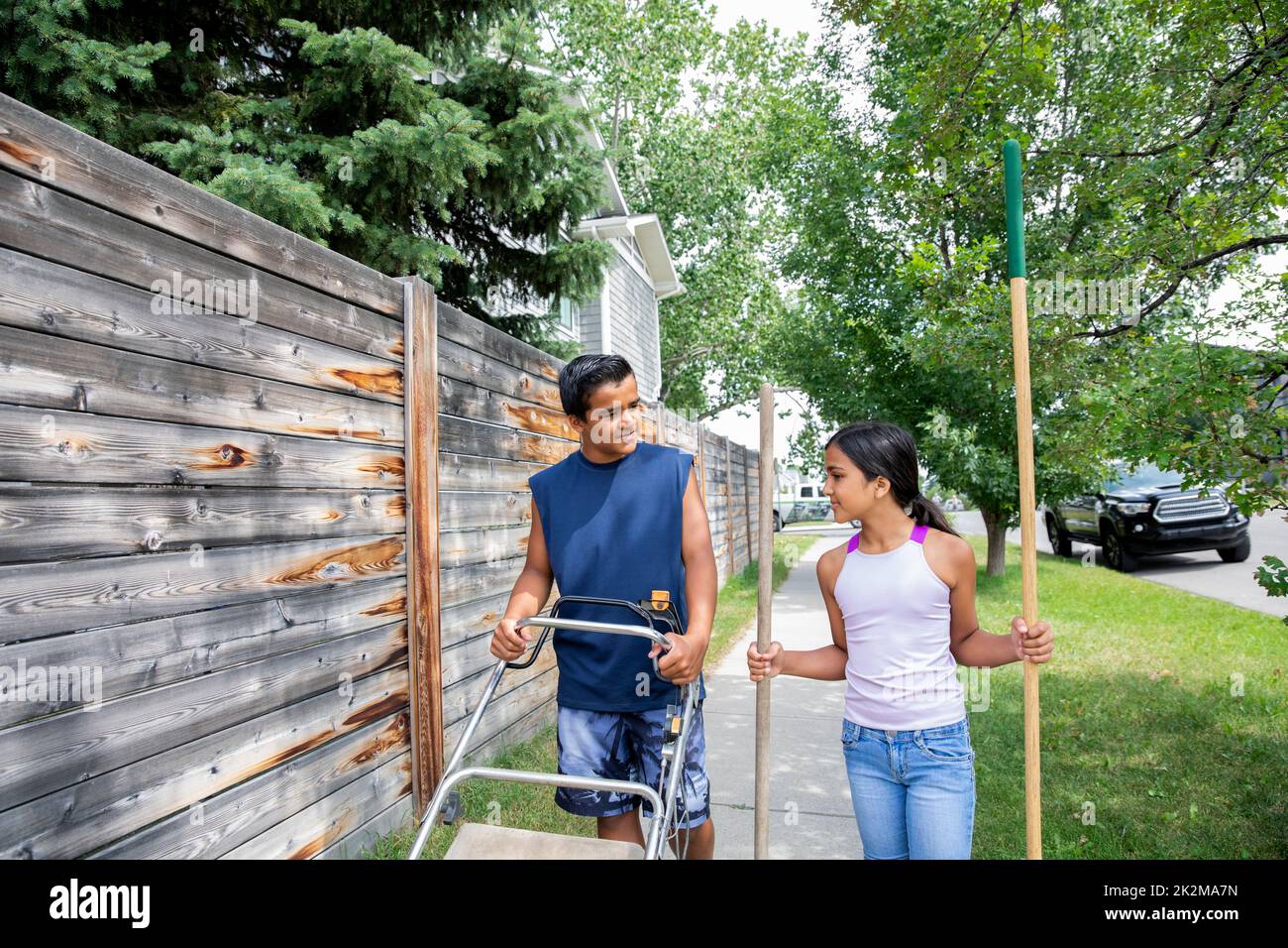 Family neighborhood walk hi-res stock photography and images - Alamy