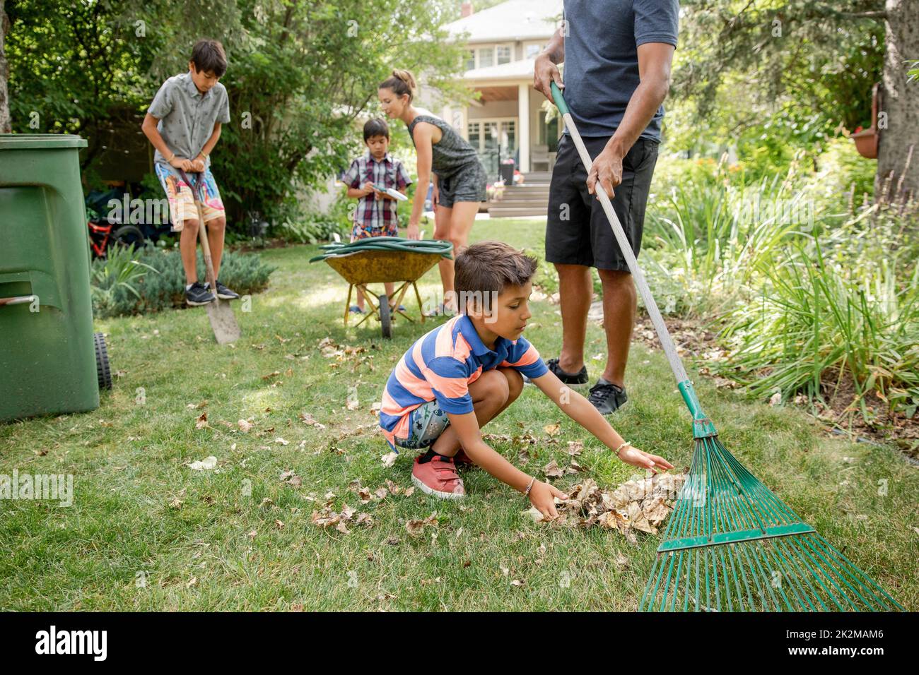 Child chores garden hi-res stock photography and images - Alamy