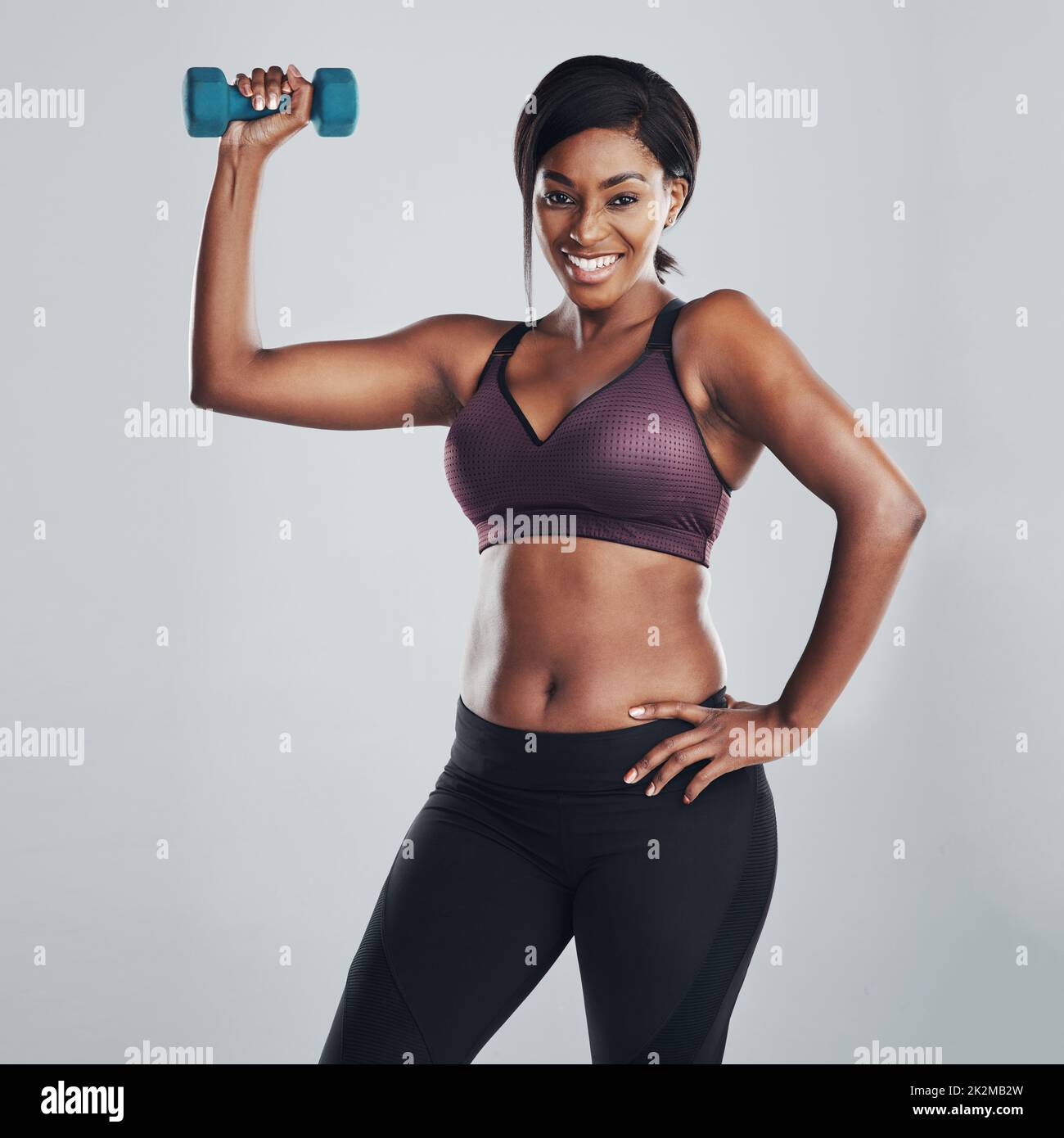 Strength mixed with beauty, what a combo. Studio portrait of an attractive and fit young woman ...