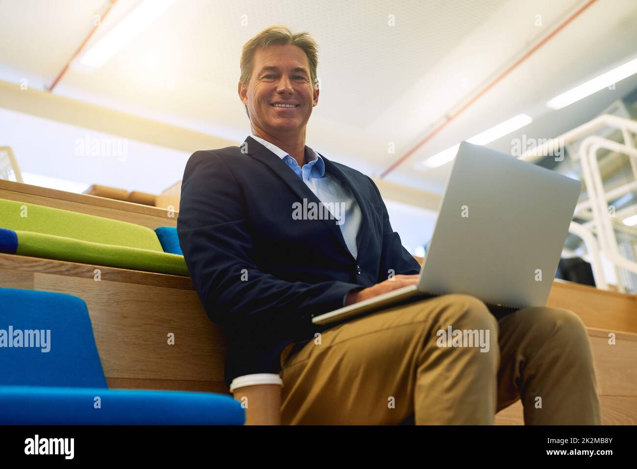 Creative surroundings keep my ideas fresh. Portrait of a successful ...