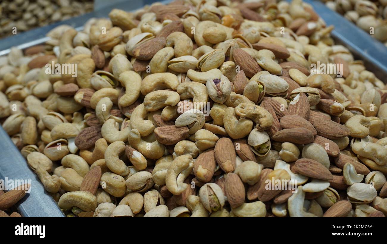 Assorted nuts texture randomly spread around in local market Stock ...