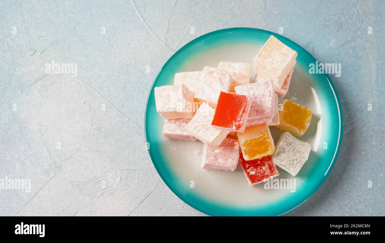 Assorted Turkish delights Rahat lokum. Colorful cubes of Turkish ...