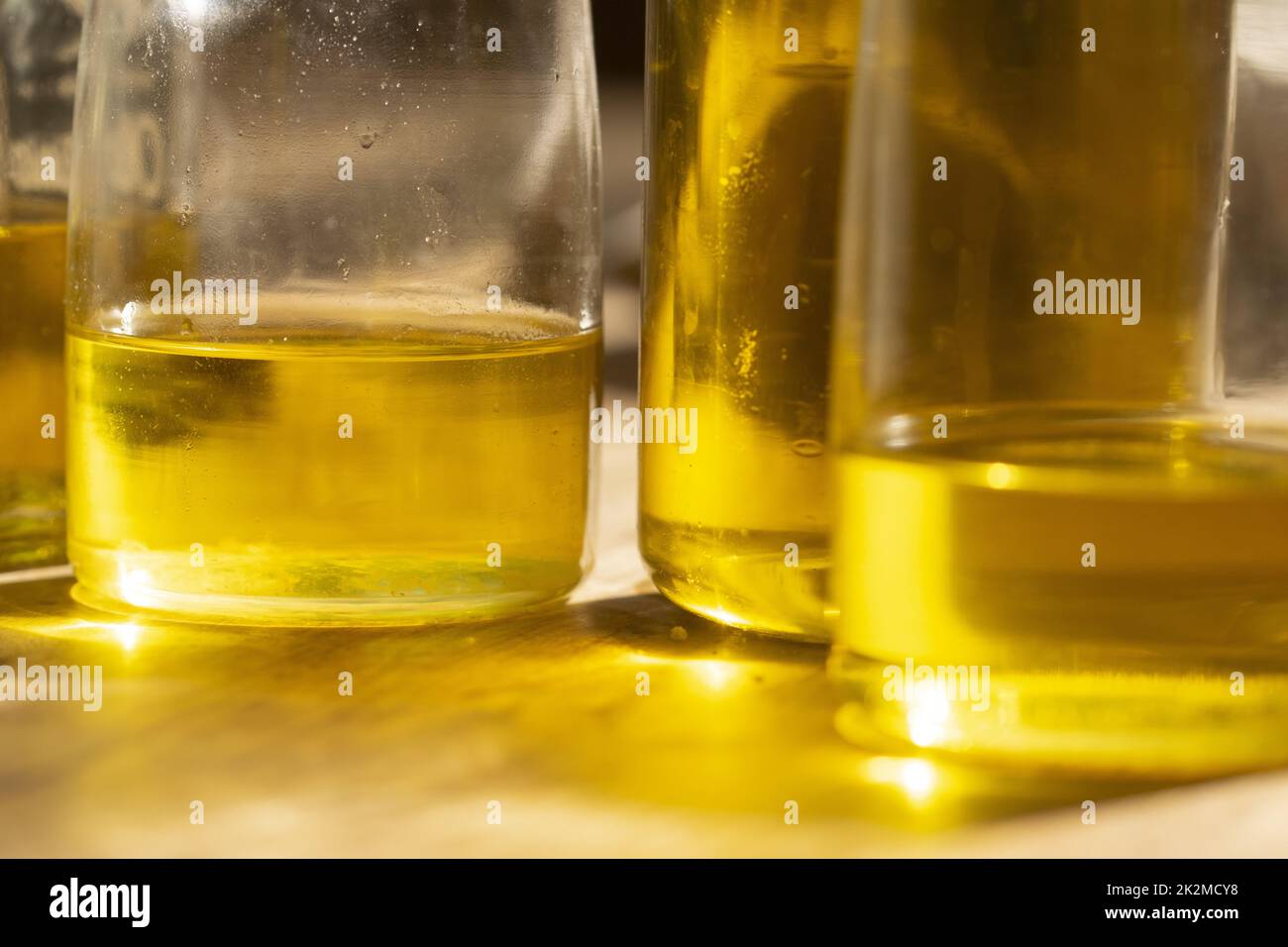 lights of oil bottles Stock Photo - Alamy
