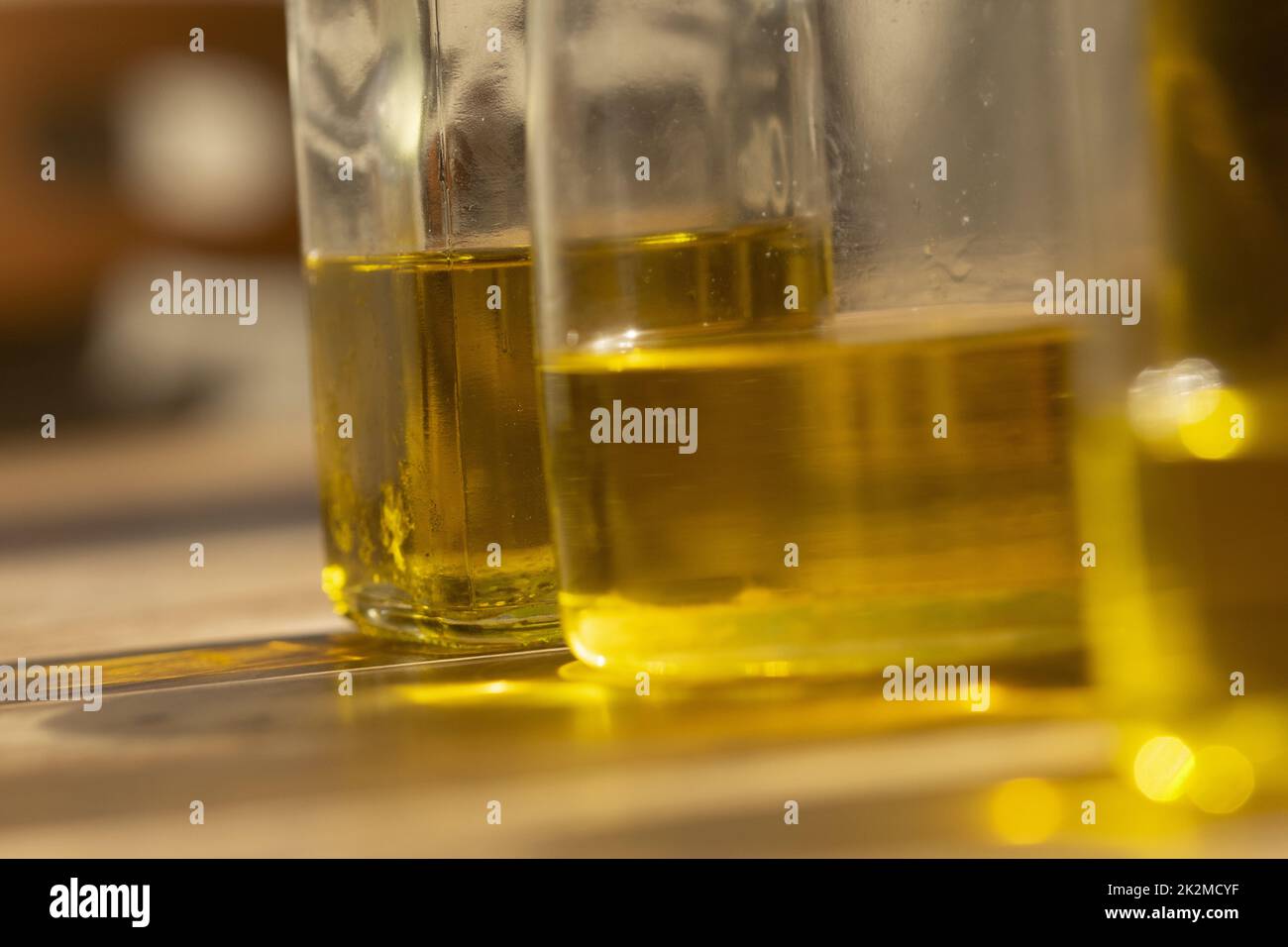 lights of oil bottles Stock Photo - Alamy