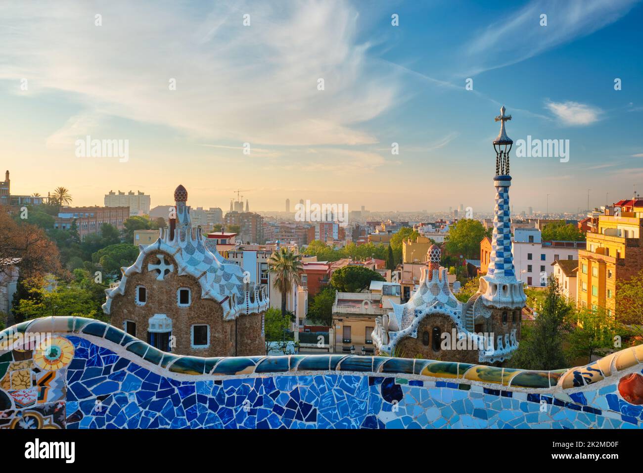 Barcelona city view from Guell Park. Sunrise view of colorful mosaic ...