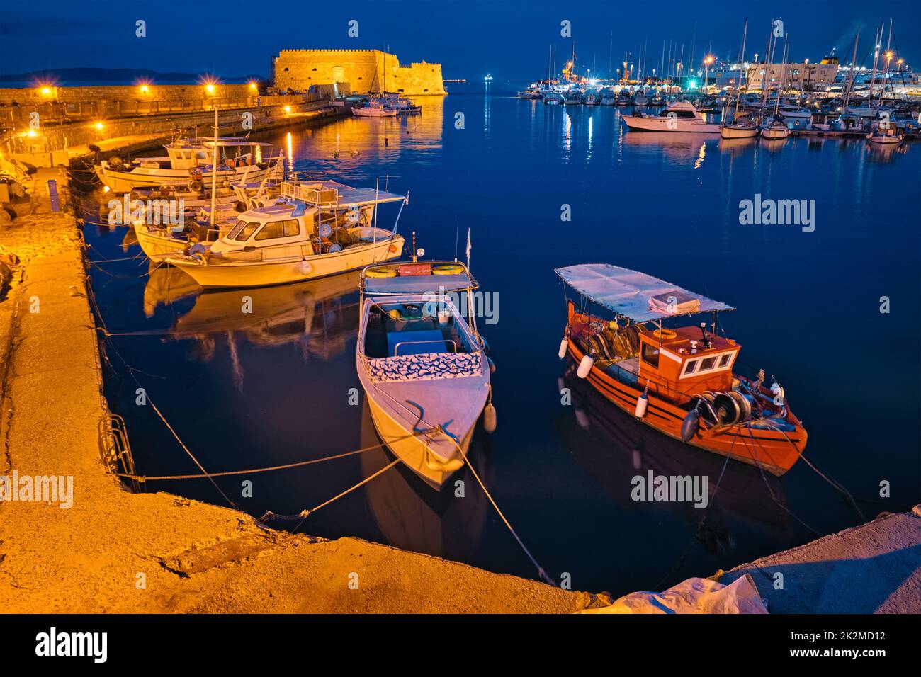 Venetian Fort in Heraklion and moored fishing boats, Crete Island ...