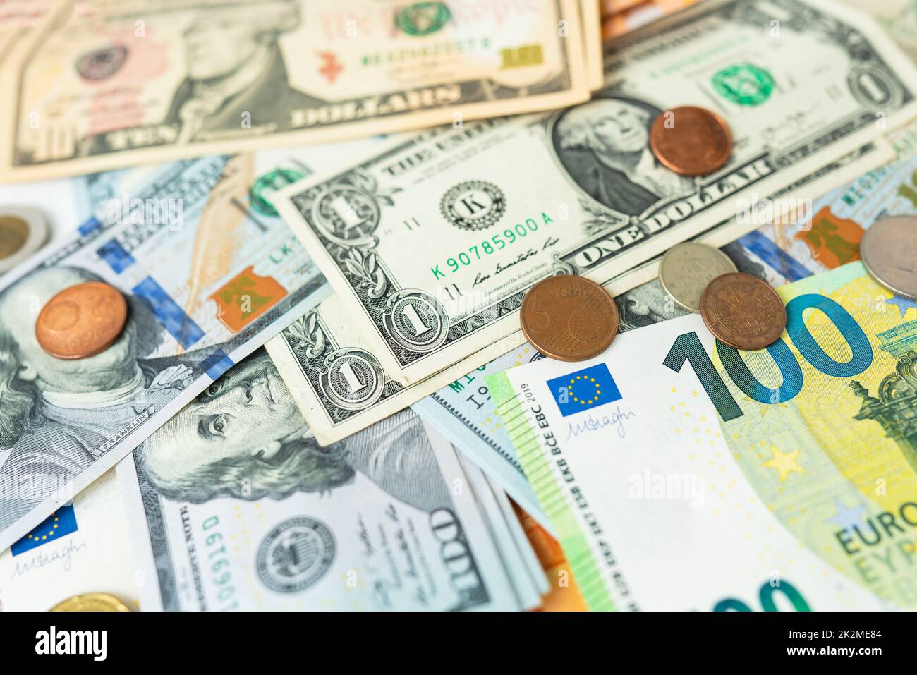 Multicurrency banknotes, coins. The concept of the world economy during ...