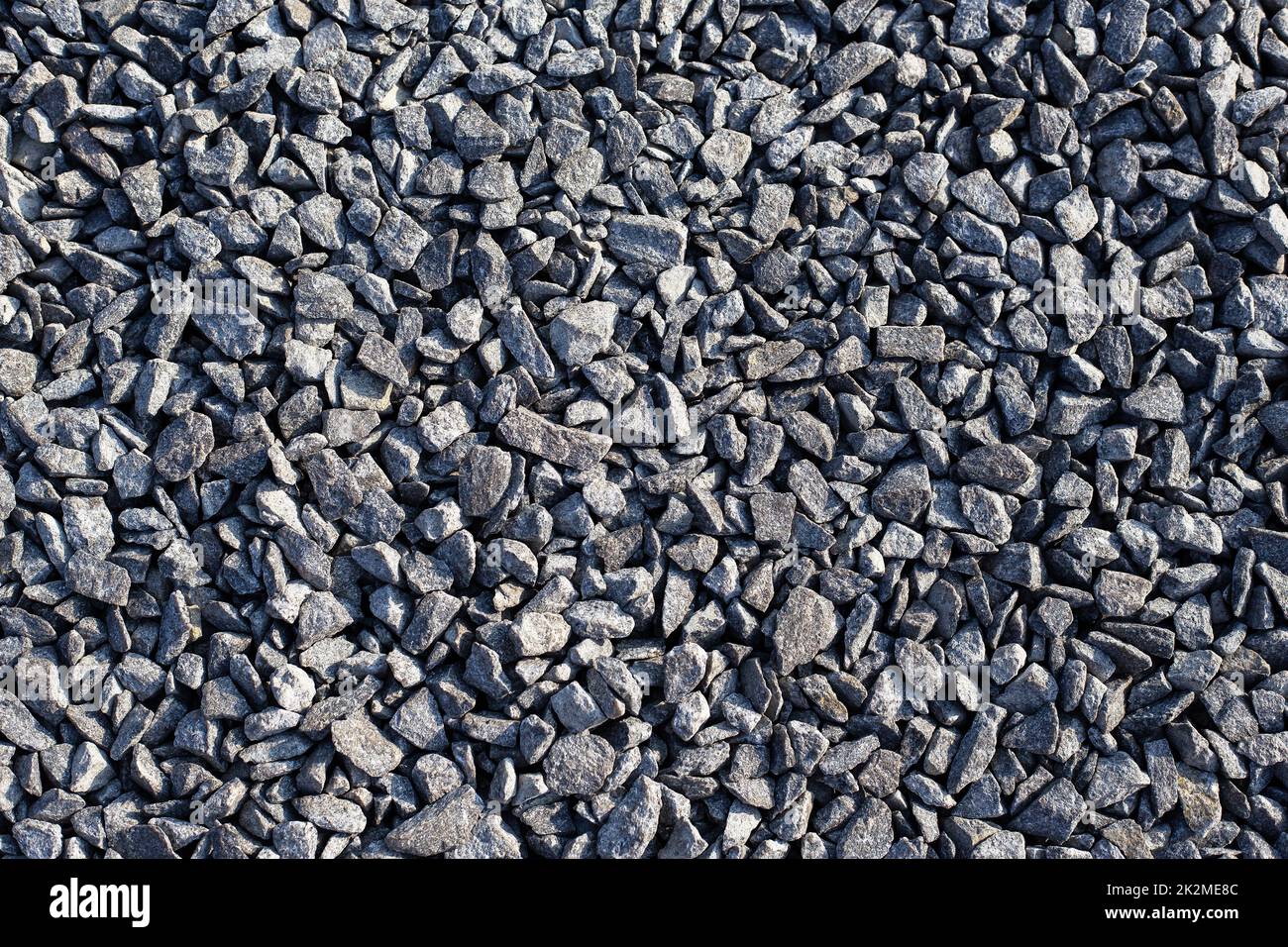 Stone, crushed stone texture background. Top view, close-up. Stone sea ...