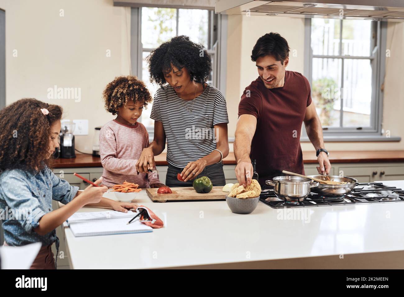 Busy mother father cooking hi-res stock photography and images - Alamy
