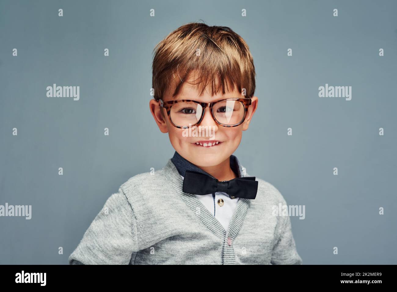 Big style for a little boy. Studio portrait of an adorable little boy ...