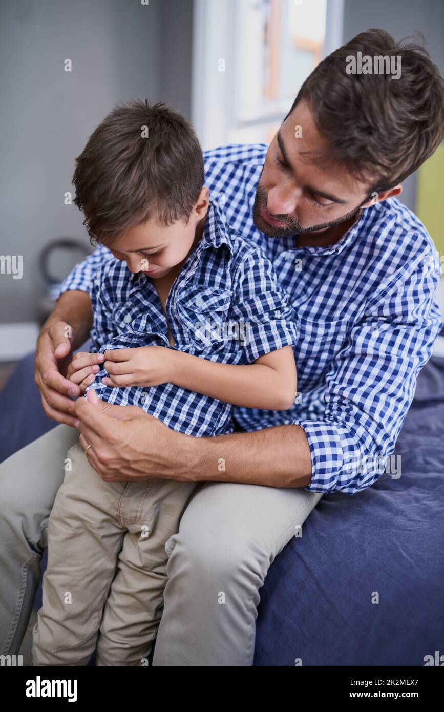 Boy getting dressed morning hi-res stock photography and images - Alamy