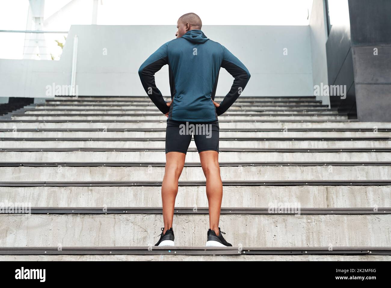 On the count of three. Rearview shot of an unrecognizable young athlete ...