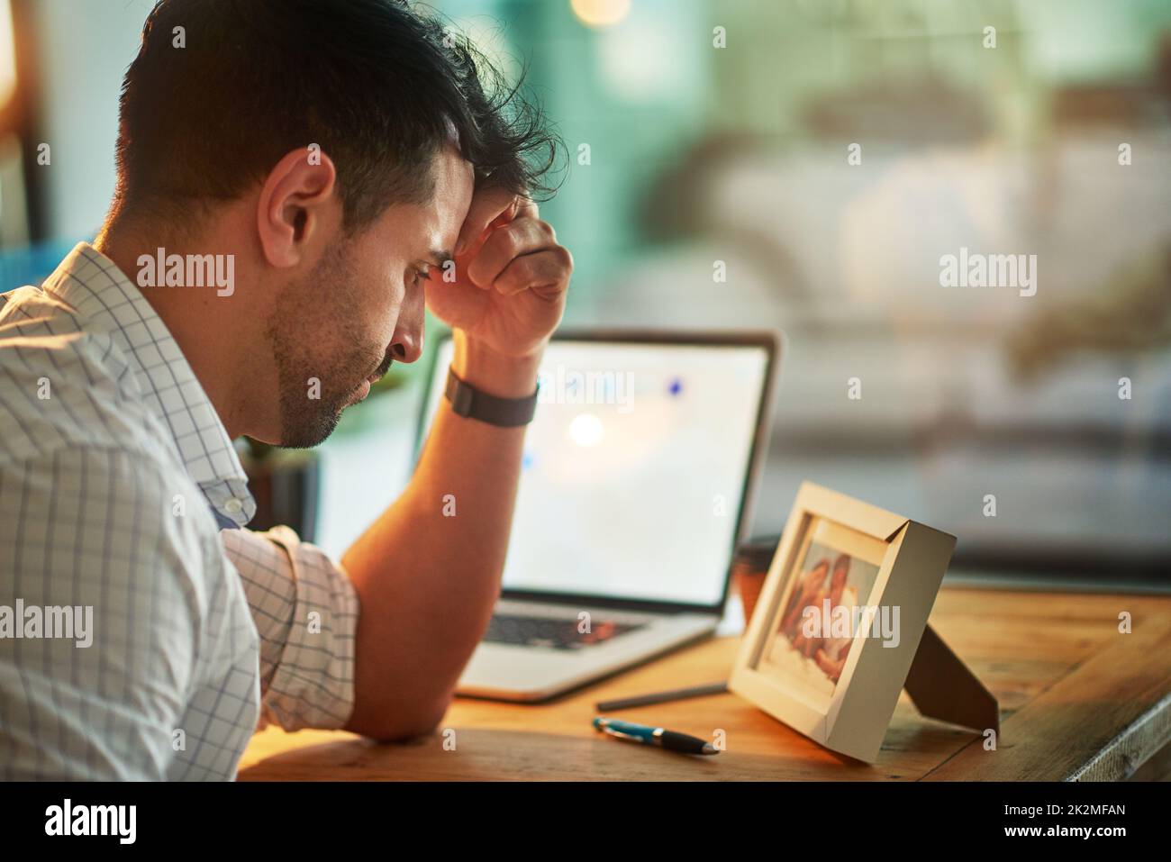 Who will look after them when Im gone. Shot of a worried businessman ...