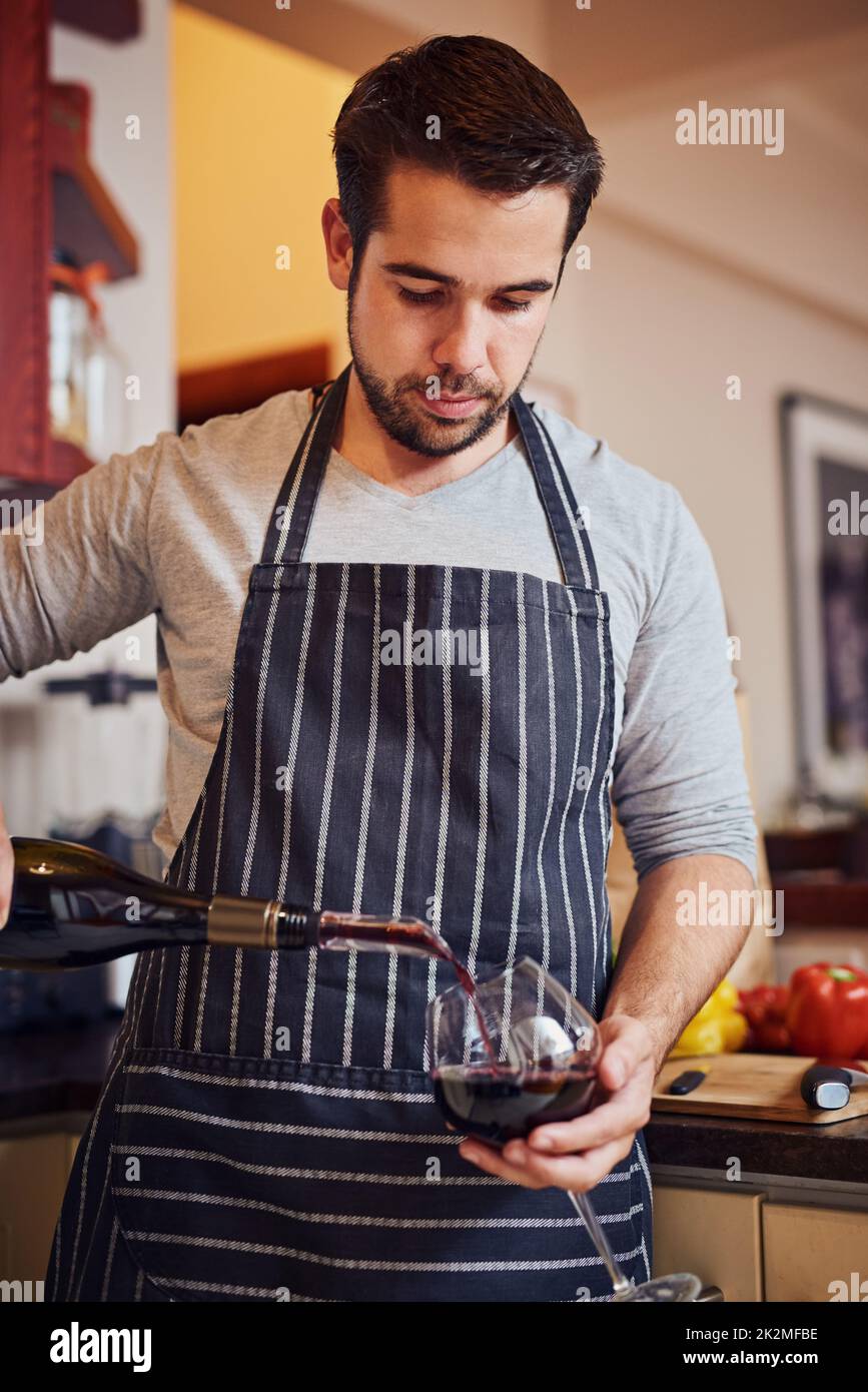 Man pouring himself a drink hi-res stock photography and images - Alamy