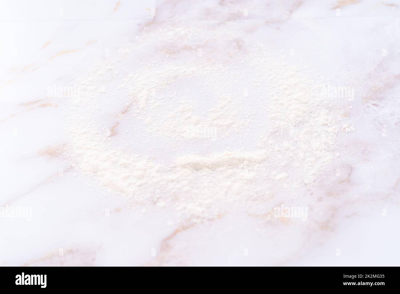 Flour on a marble surface Stock Photo - Alamy
