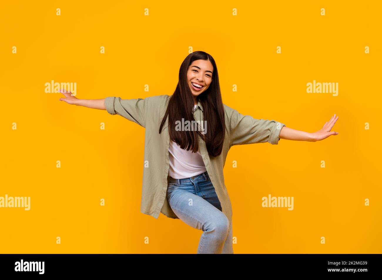 Photo of overjoyed satisfied girl chilling dancing hands wings flying ...