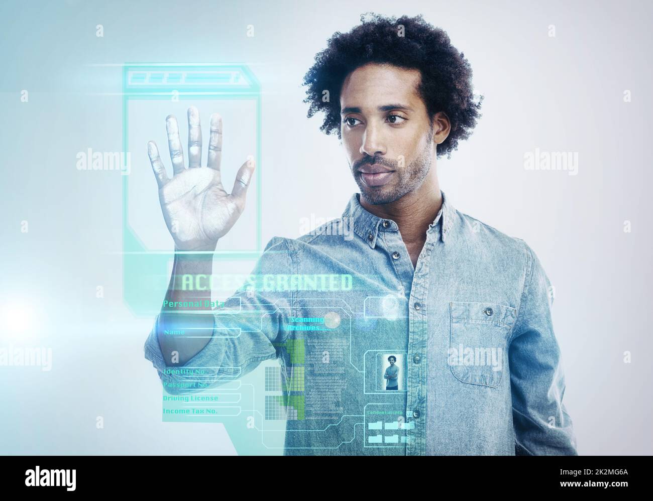 Privacy is priority. A handsome young black man using a transparent ...