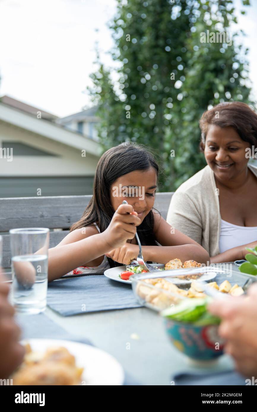 Indian family having lunch together hi-res stock photography and images ...