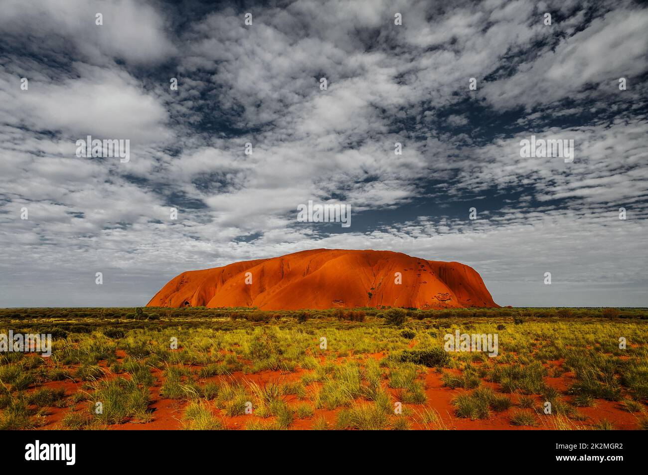 Famous Uluru in Central Australia's desert Stock Photo - Alamy